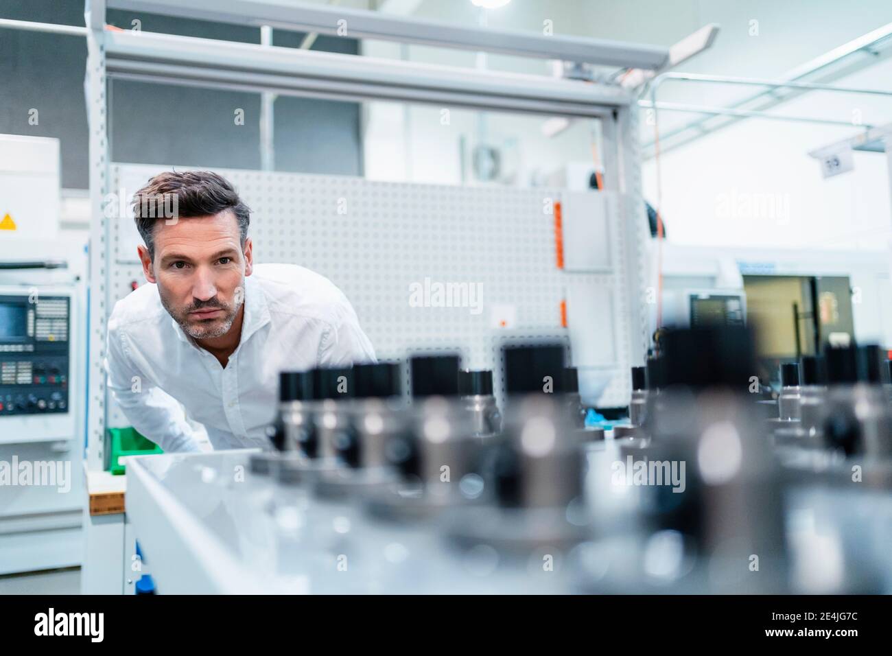 Professional manufacturing hi-res stock photography and images - Alamy
