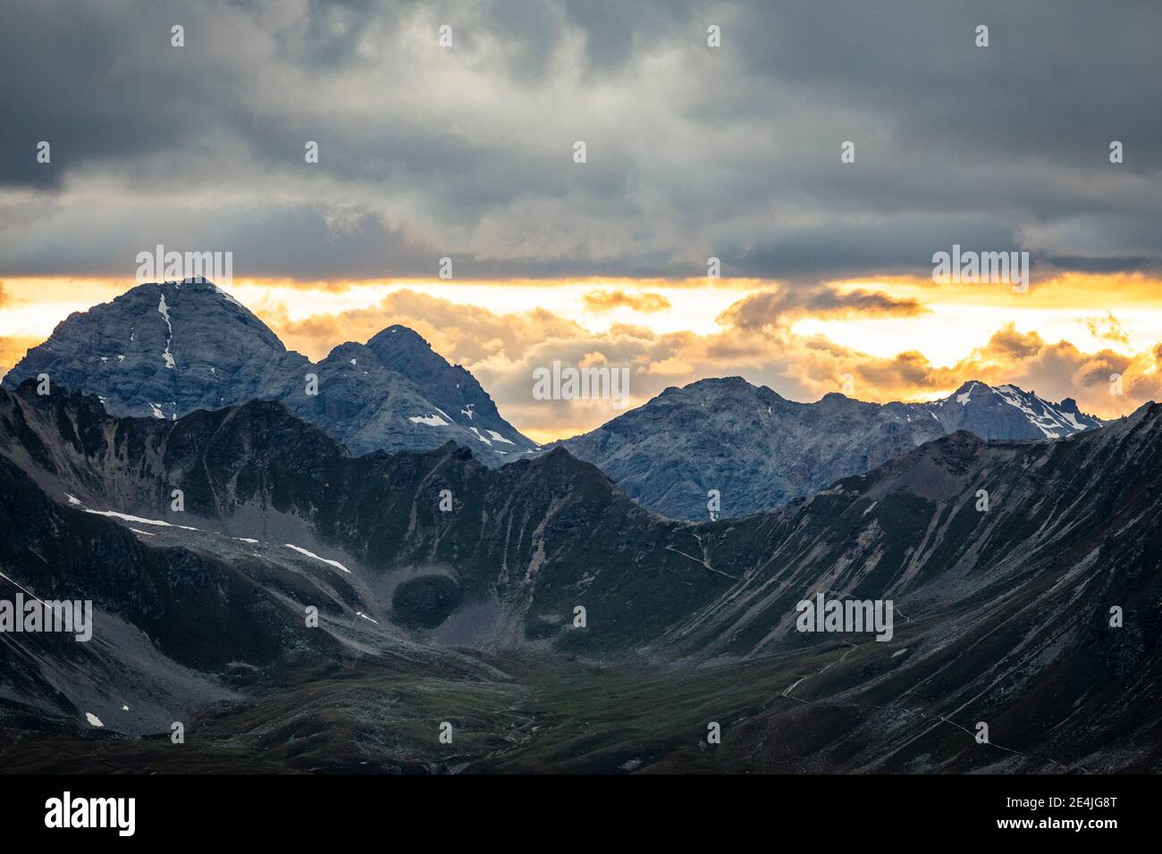 Dramatic sunset sky over mountains Stock Photo - Alamy