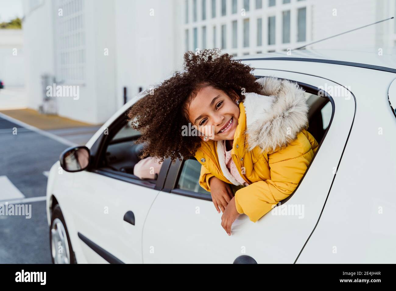 Child peeking through window hi-res stock photography and images - Alamy