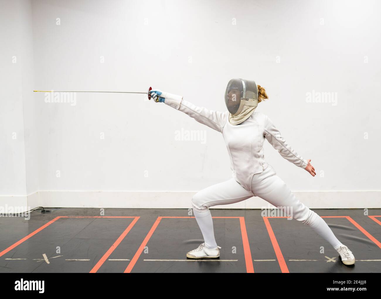 Woman in fencing outfit hi-res stock photography and images - Alamy