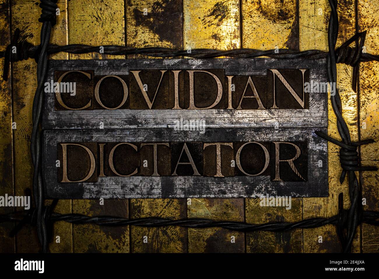 Covidian Dictator text formed with real authentic typeset letters with ...