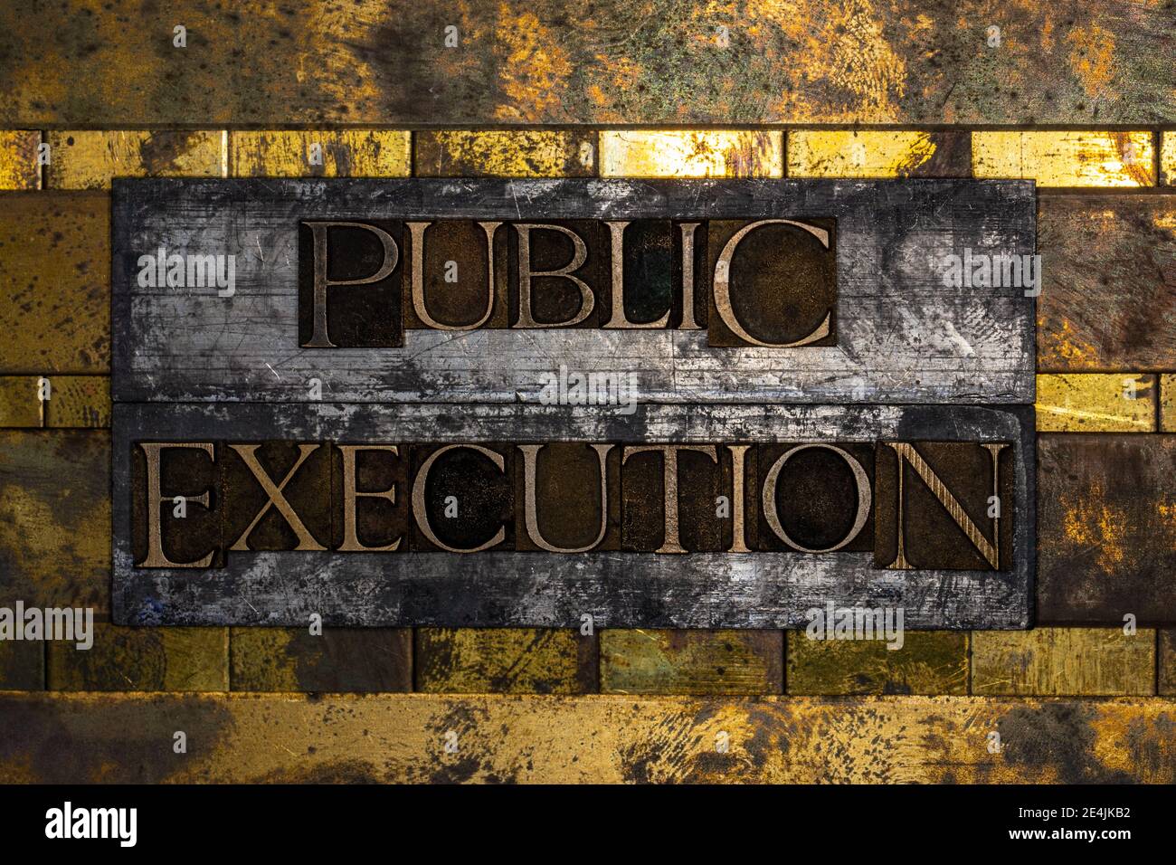 Public Execution text on textured grunge copper and vintage gold grid ...
