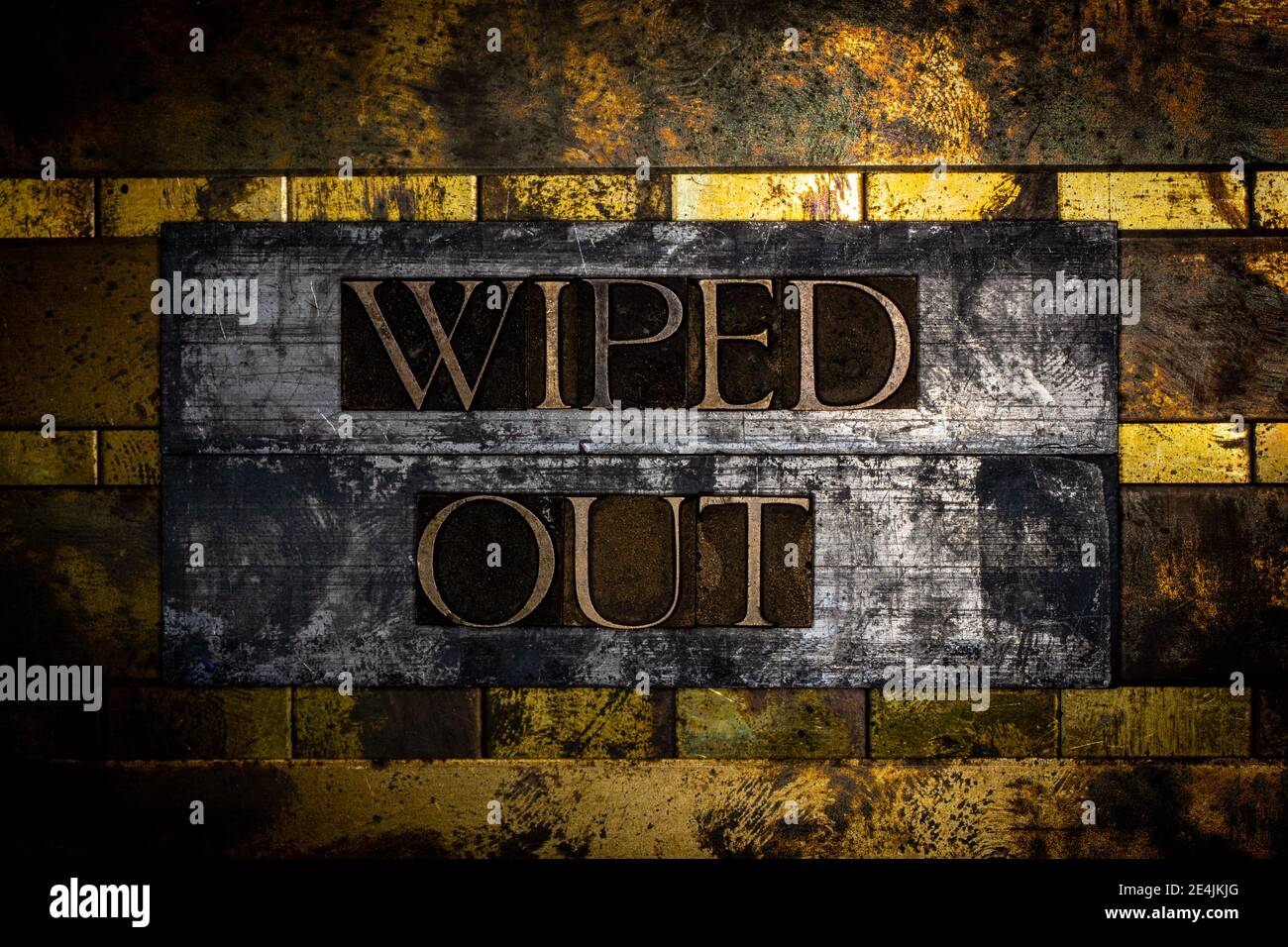 Wiped Out text on vintage textured silver grunge copper and gold ...