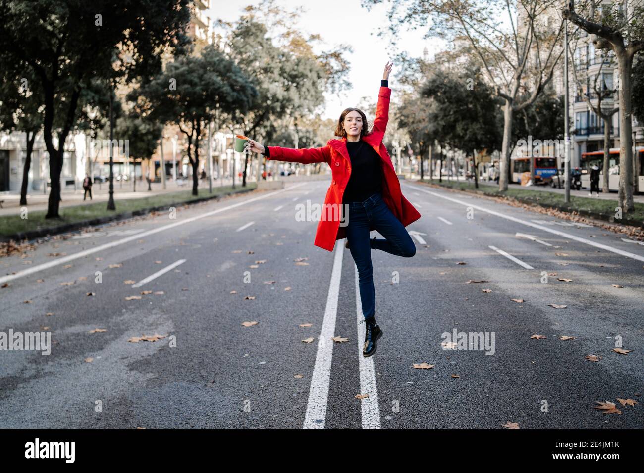 Young woman dancing jump hi-res stock photography and images - Alamy