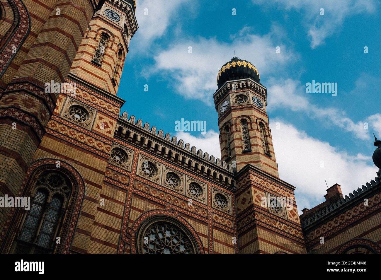 historical building under blue sky Stock Photo - Alamy