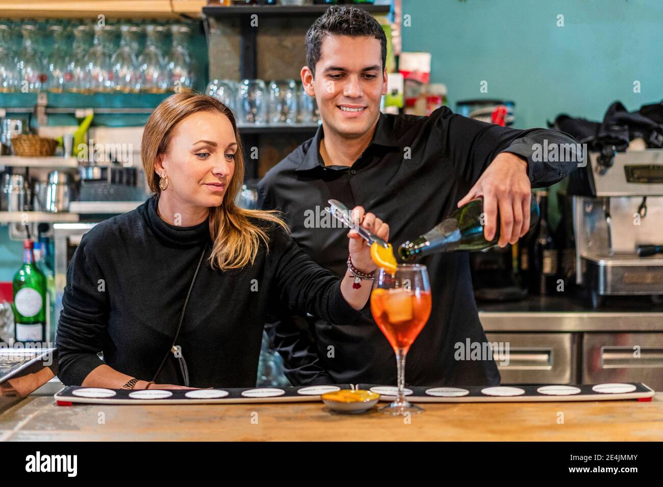 Female bar assistant hi-res stock photography and images - Alamy