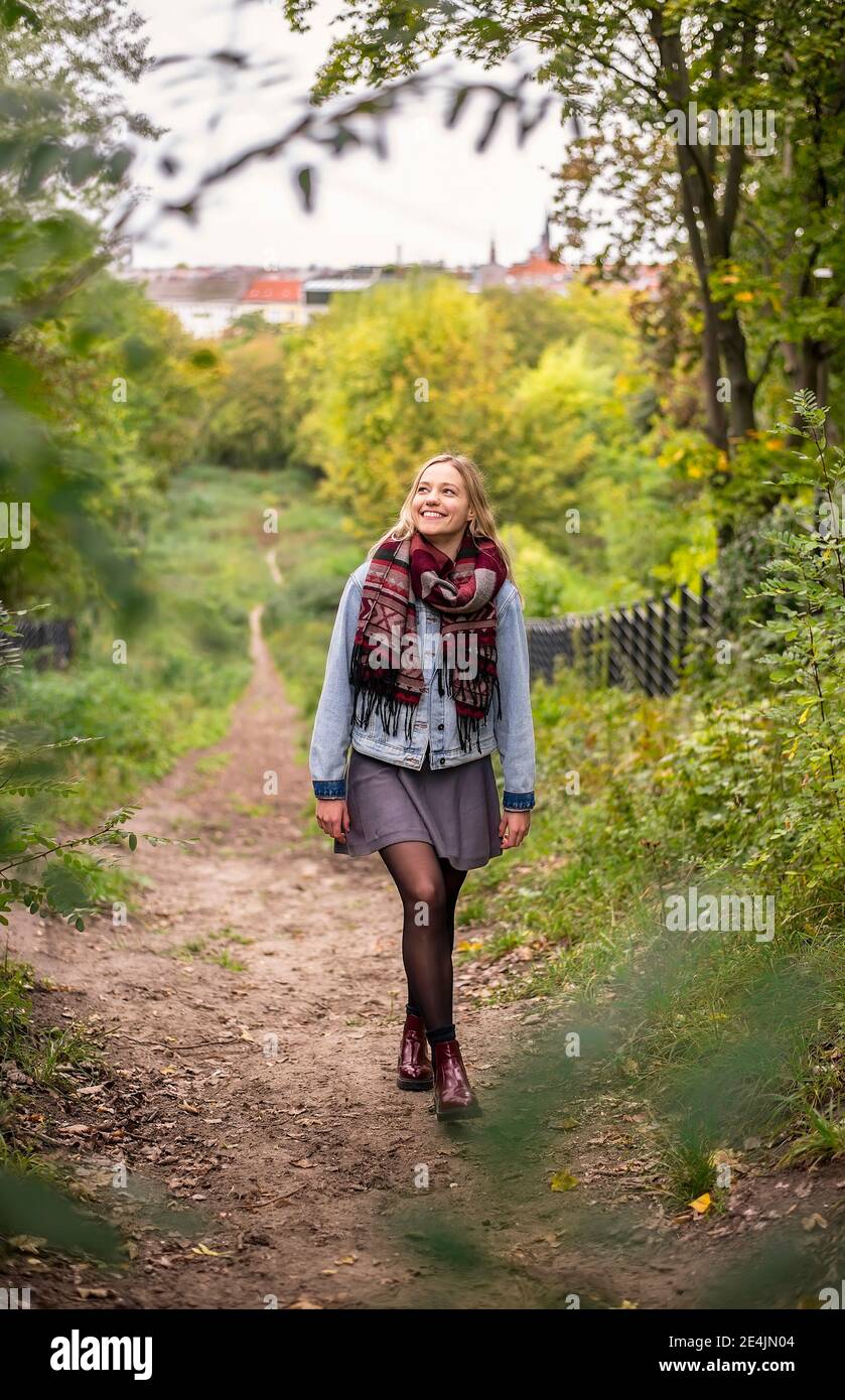 Woman walking in park autumn hi-res stock photography and images - Alamy