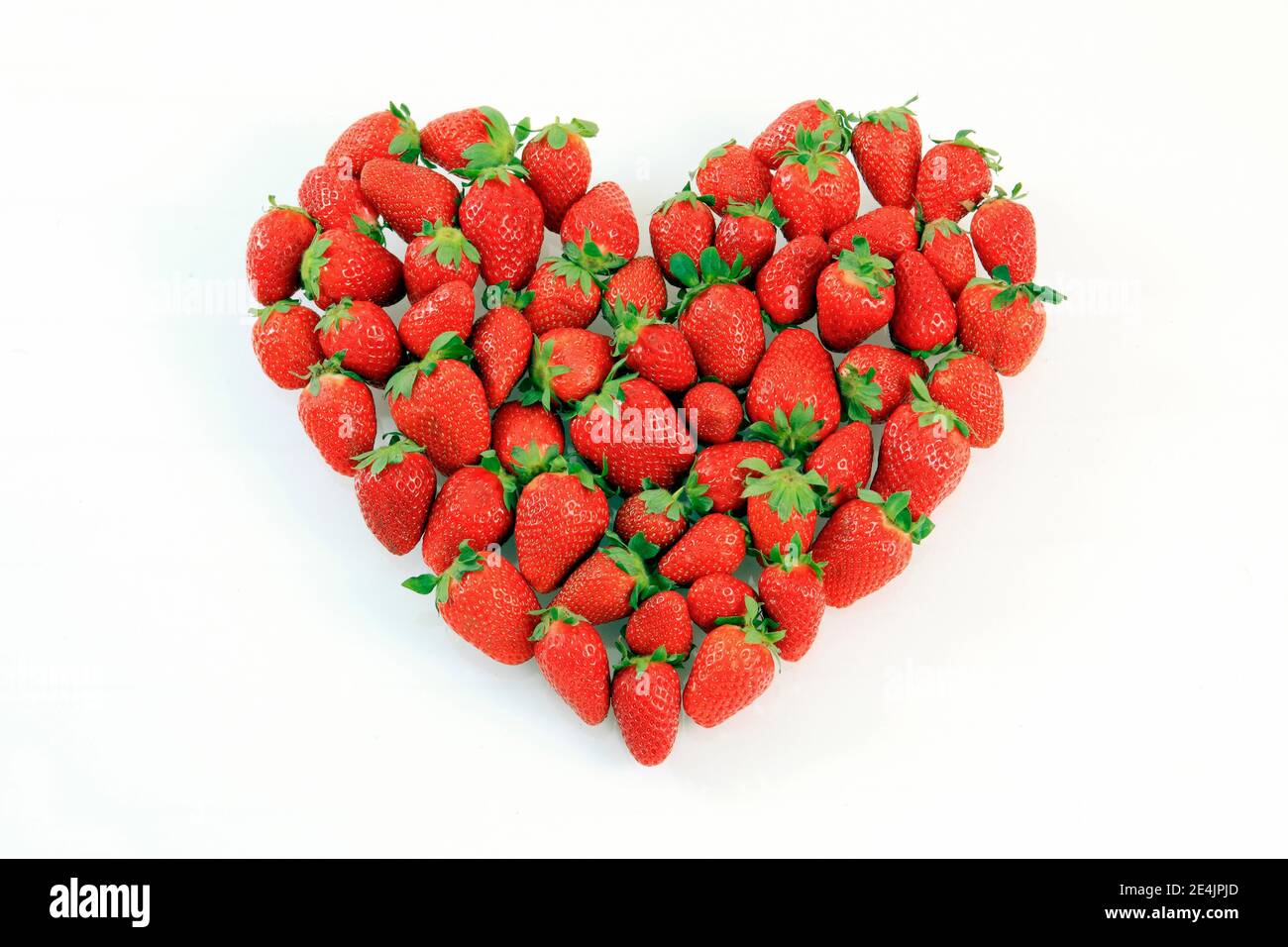 Strawberries in the shape of a heart Stock Photo - Alamy