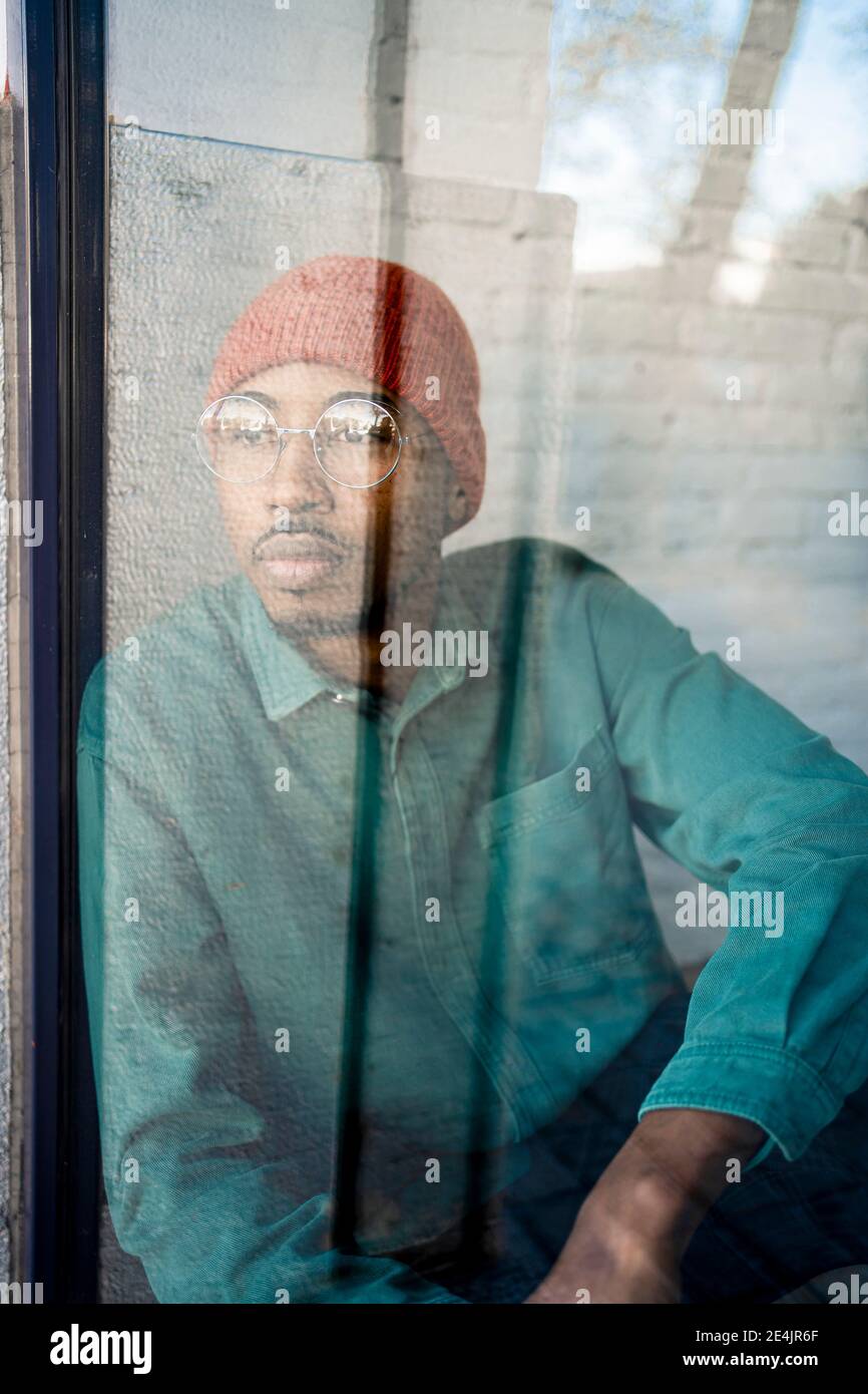 Adult at window hi-res stock photography and images - Alamy