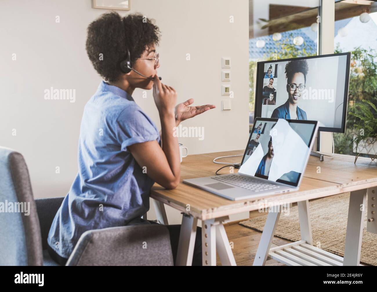 Caucasian woman having video conference hi-res stock photography and ...