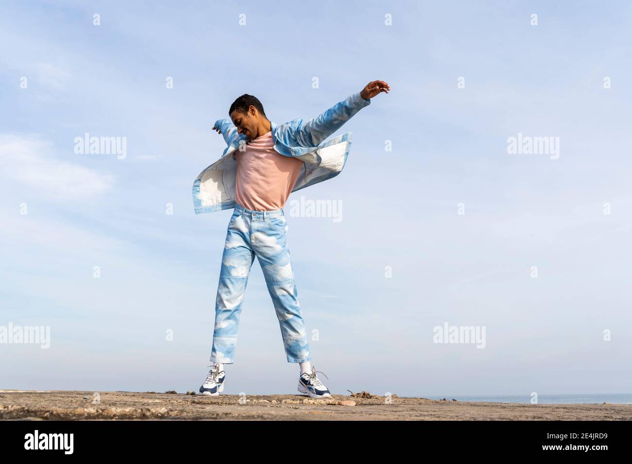 Arms outstretched to sky hi-res stock photography and images - Alamy