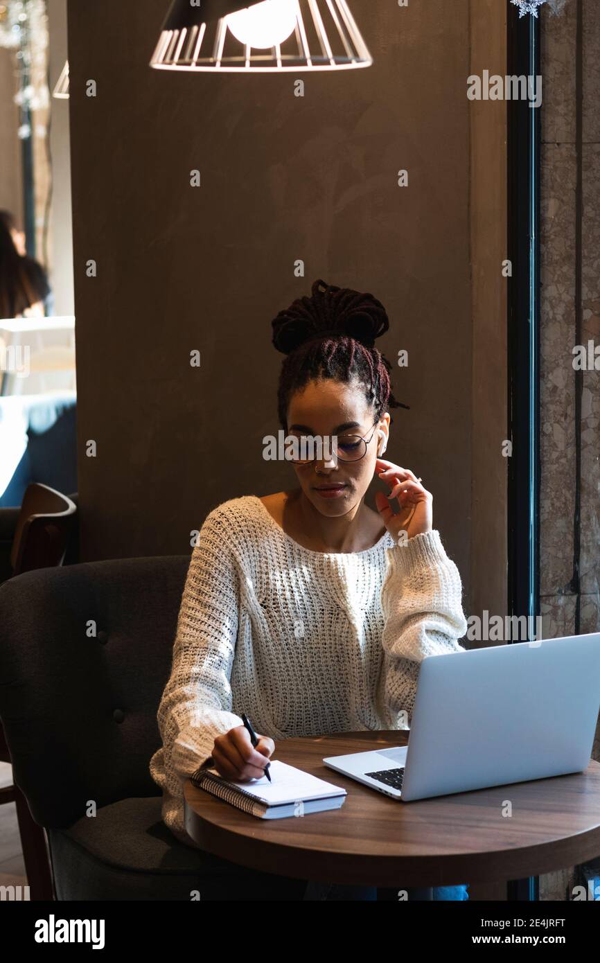 Woman writing diary hi-res stock photography and images - Alamy