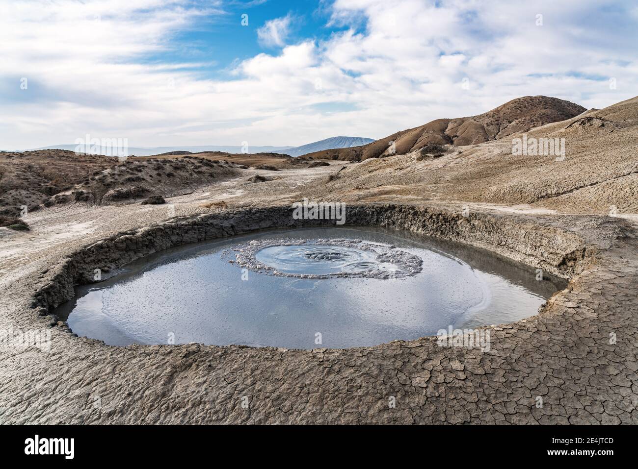 Large crater of mud volcano Stock Photo - Alamy