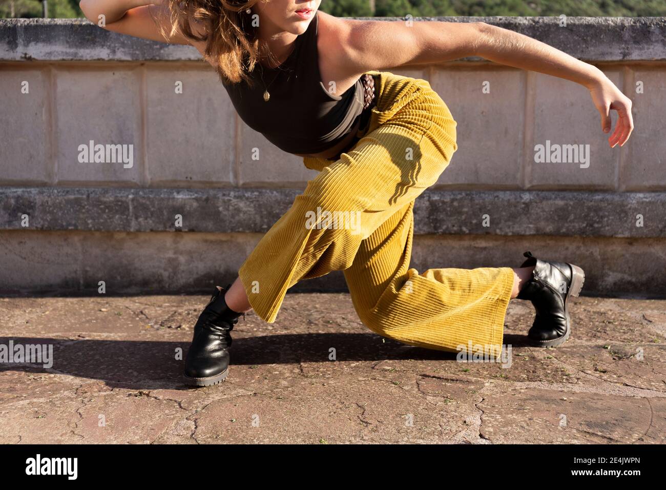 Young woman dancing outdoors hi-res stock photography and images - Alamy