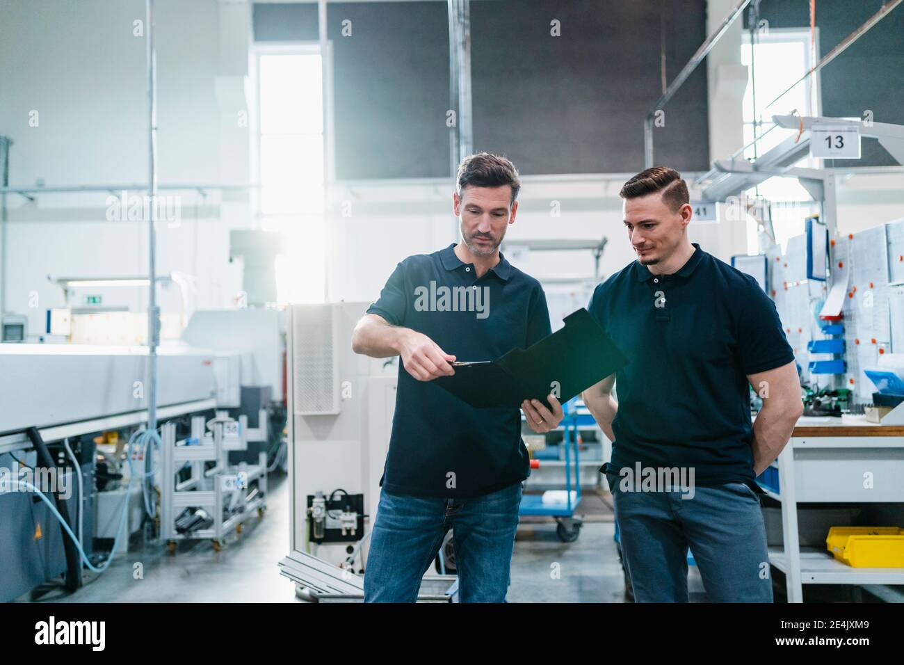 Engineer man standing back on hi-res stock photography and images - Alamy