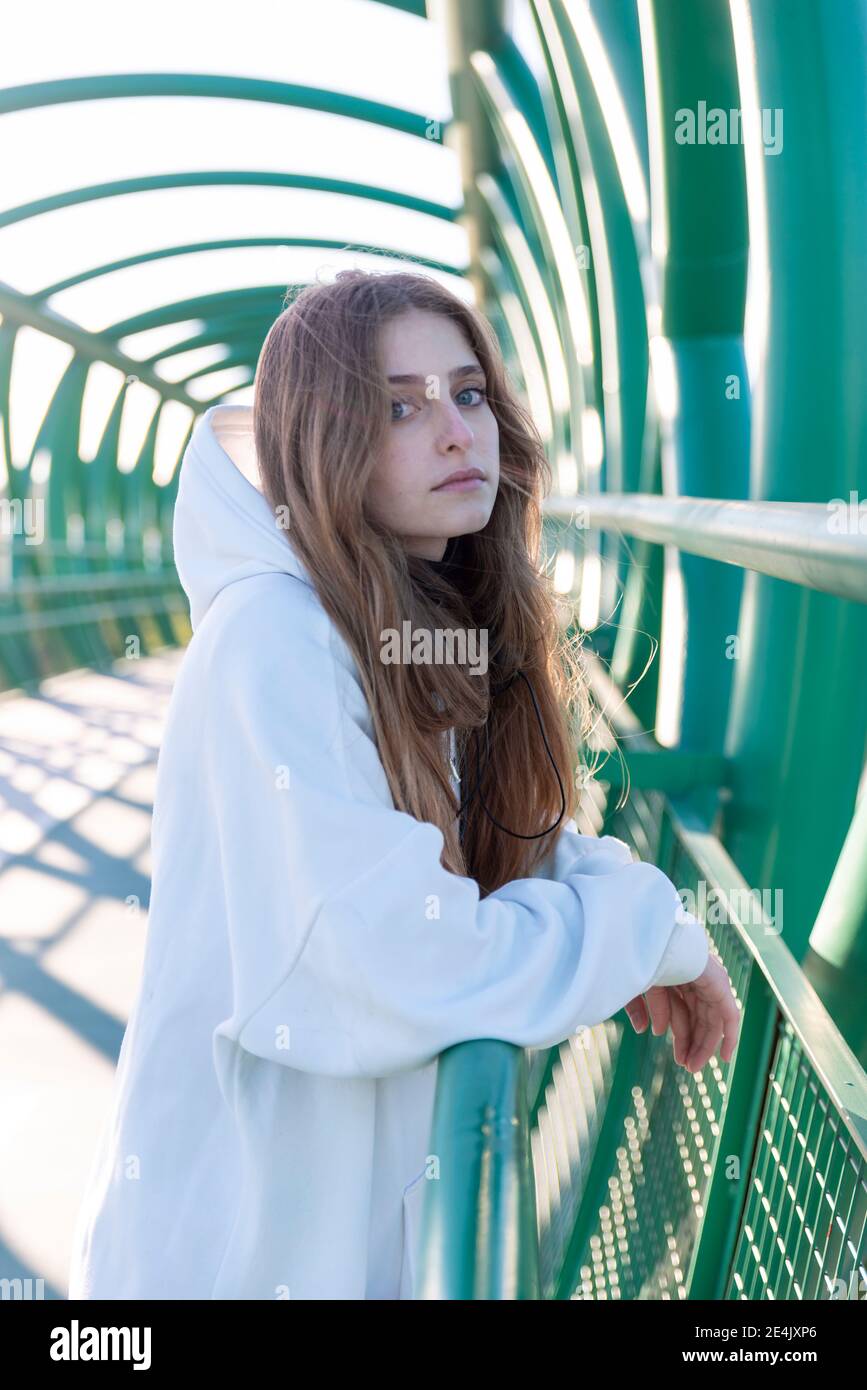 Leaning on bridge railing hi-res stock photography and images - Alamy
