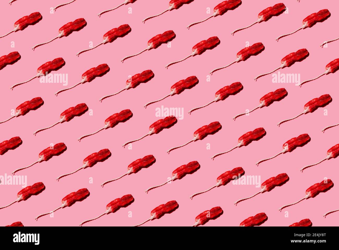 Pattern of used tampons against pink background Stock Photo - Alamy