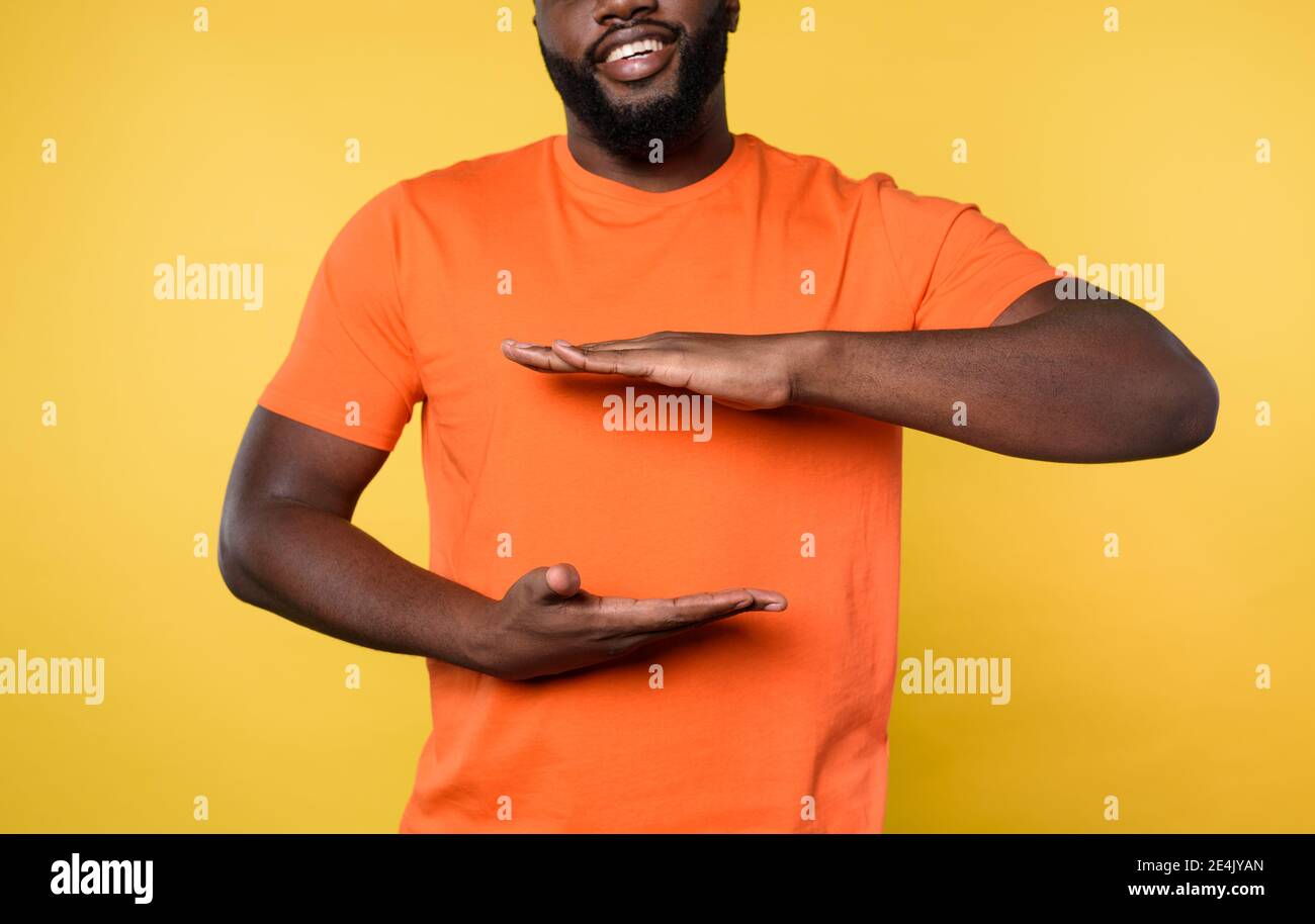 Man holds something with hands. Concept of protection. Yellow ...