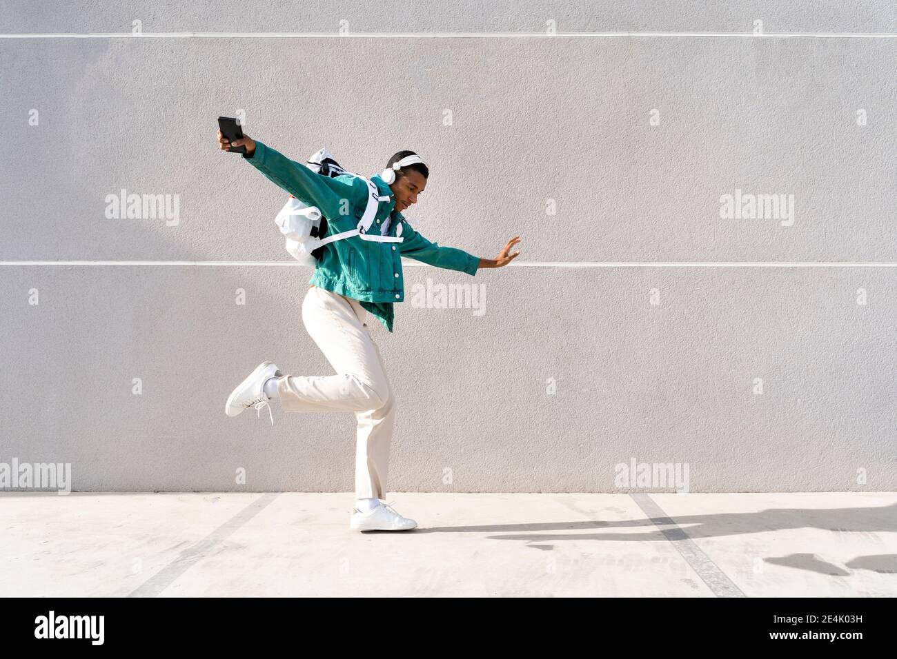 Carefree man dancing arms hi-res stock photography and images - Alamy