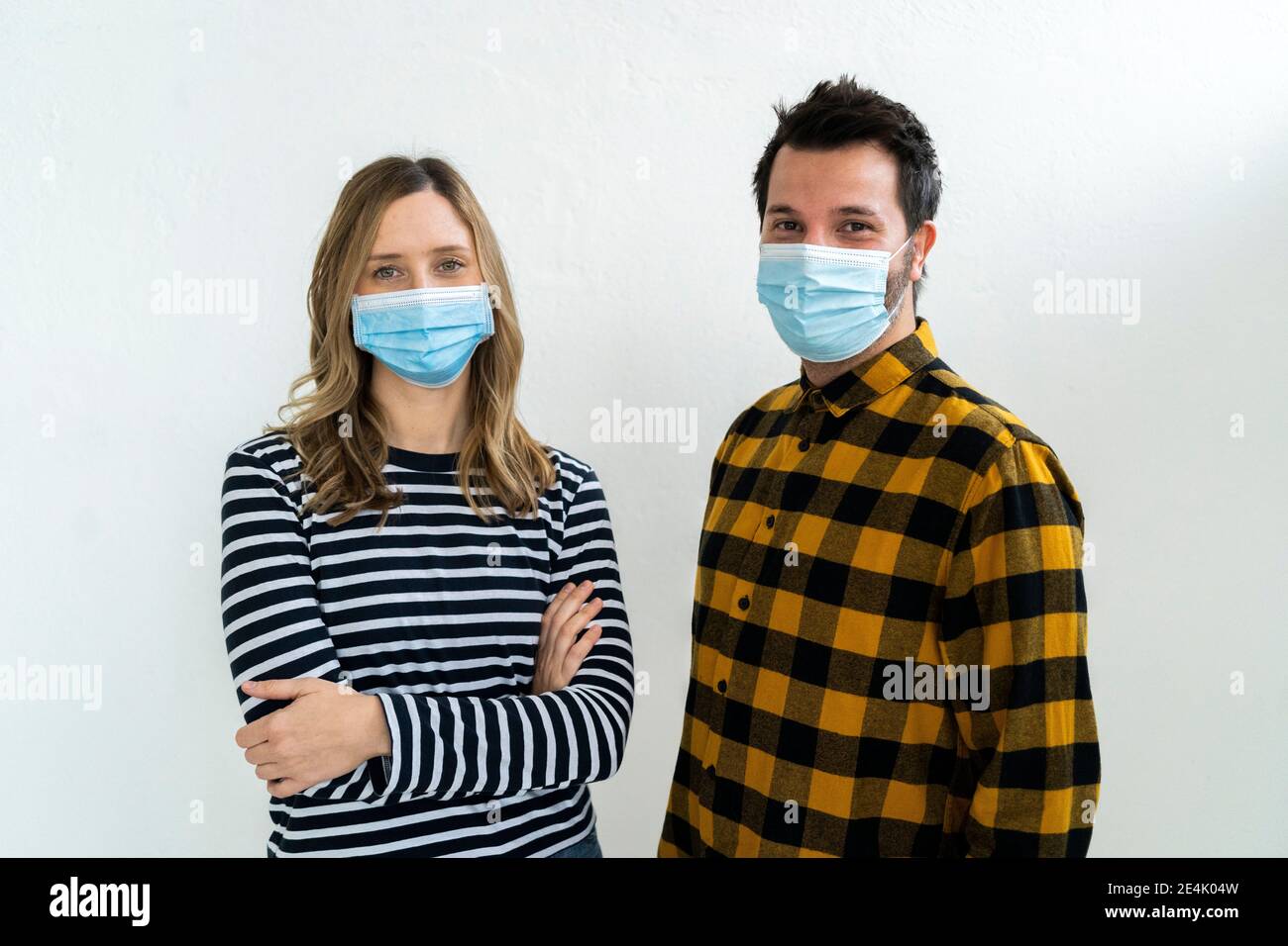 Two men wearing masks hi-res stock photography and images - Alamy