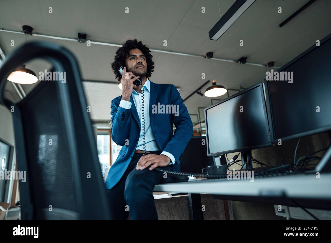 Landline phone man hi-res stock photography and images - Alamy