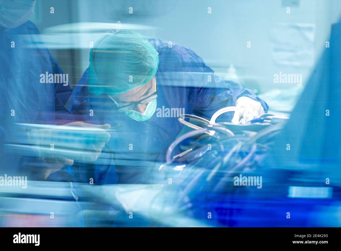 Male doctors doing surgery in operating room at hospital Stock Photo ...