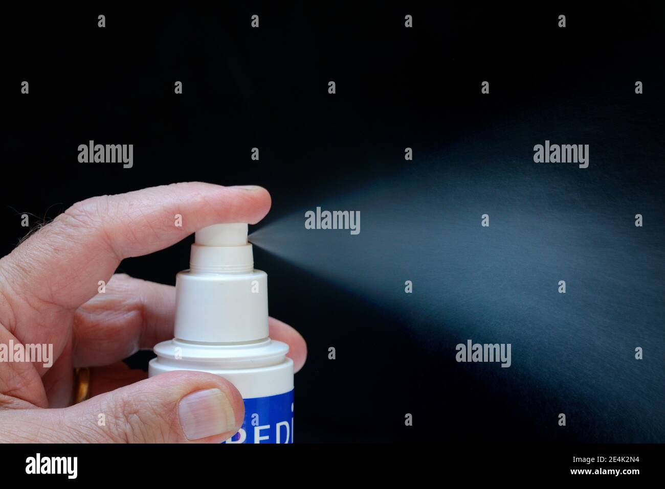 Spray bottle in hand hi-res stock photography and images - Alamy