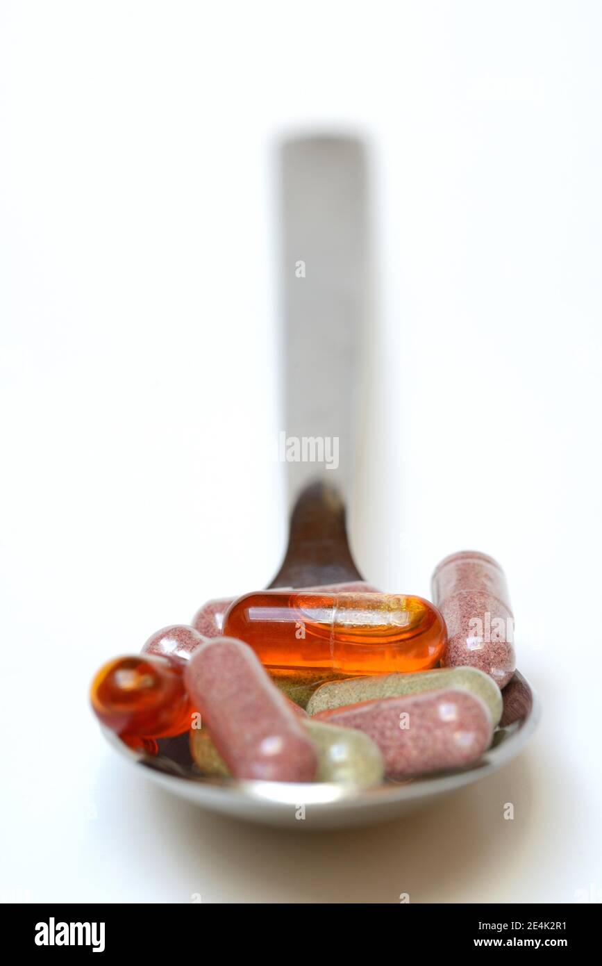 Capsules on spoon, Omega-3 fatty acids, vitamins, fish oil capsule ...