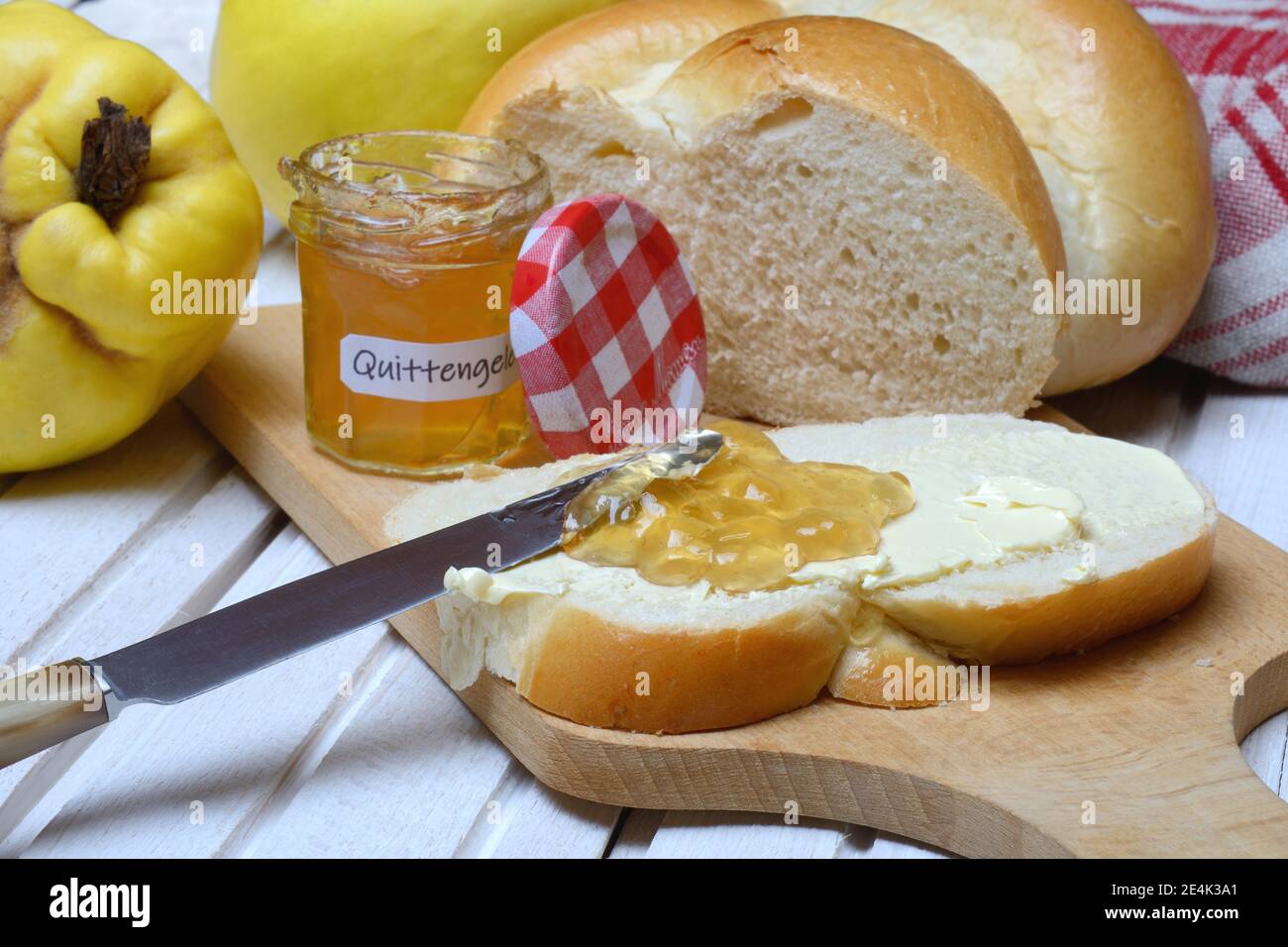 Slice of butter plait with quince jelly, quince jelly, Cydonia oblonga ...