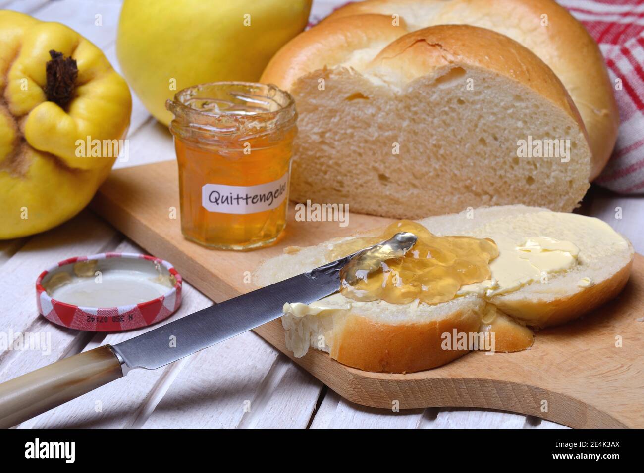 Slice of butter plait with quince jelly, quince jelly, Cydonia oblonga ...