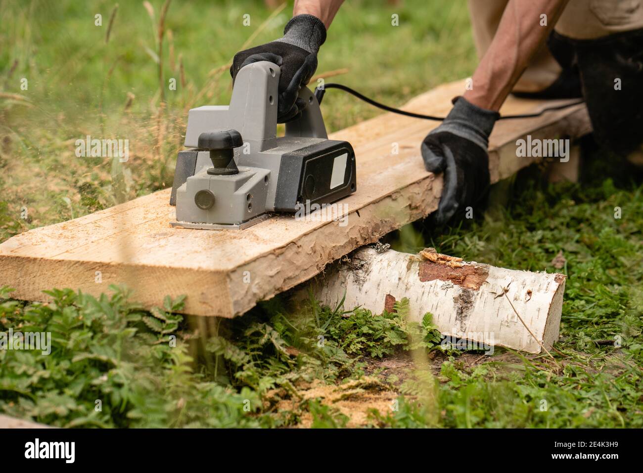 Man holding saw hi-res stock photography and images - Alamy