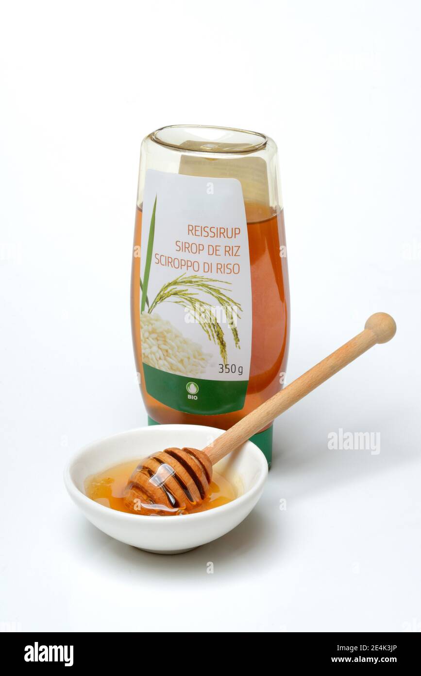 Honey spoon in bowl hi-res stock photography and images - Alamy