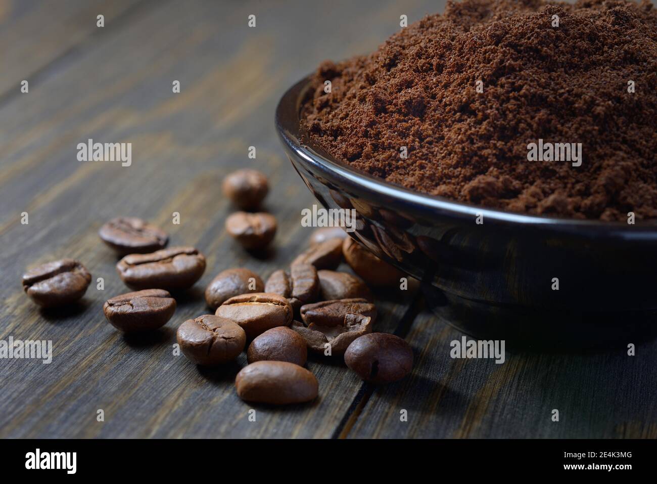 Coffee beans and coffee powder in shell, Coffea arabica Stock Photo - Alamy