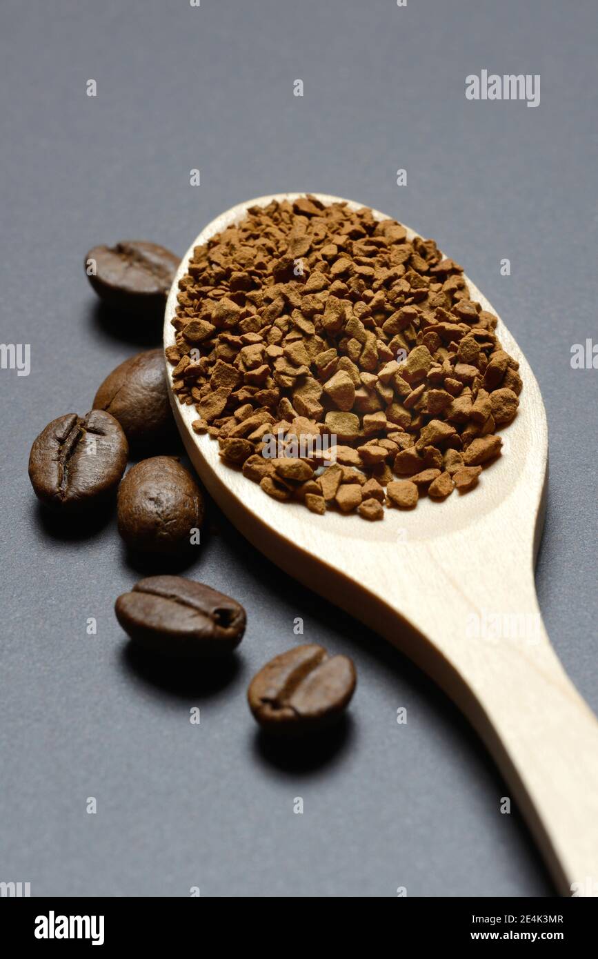Instant coffee and coffee beans, Coffea arabica Stock Photo - Alamy