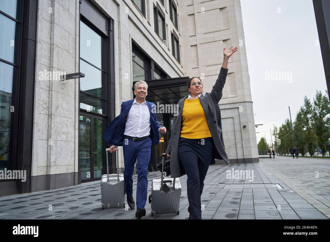 Waving hand to colleagues hi-res stock photography and images - Alamy