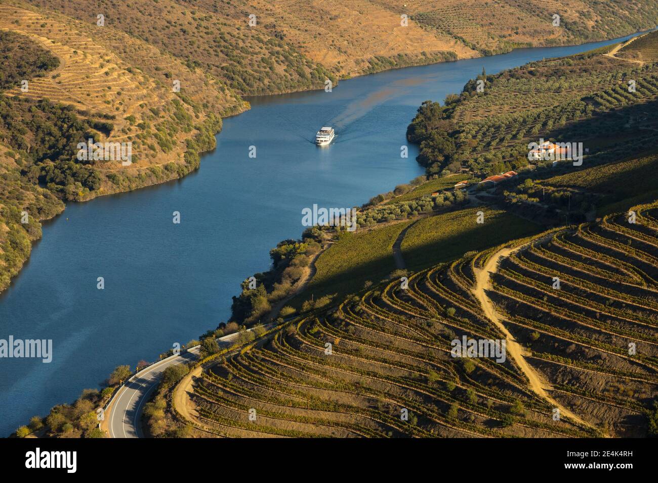 Tourist cruise ship in Douro river and Alto Douro vineyards - UNESCO ...