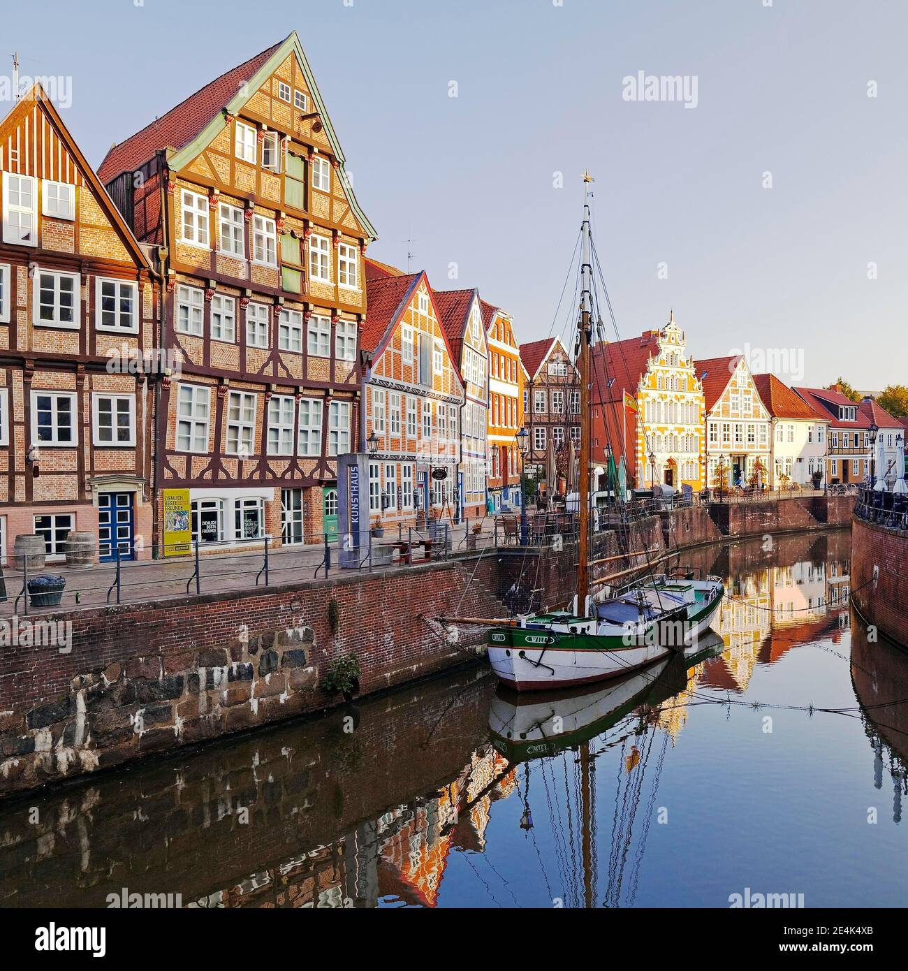 Historic merchant and warehouse houses at the Hanseatic port with the ...