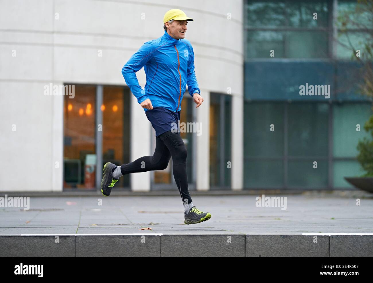 Man jogging on pavement hi-res stock photography and images - Alamy