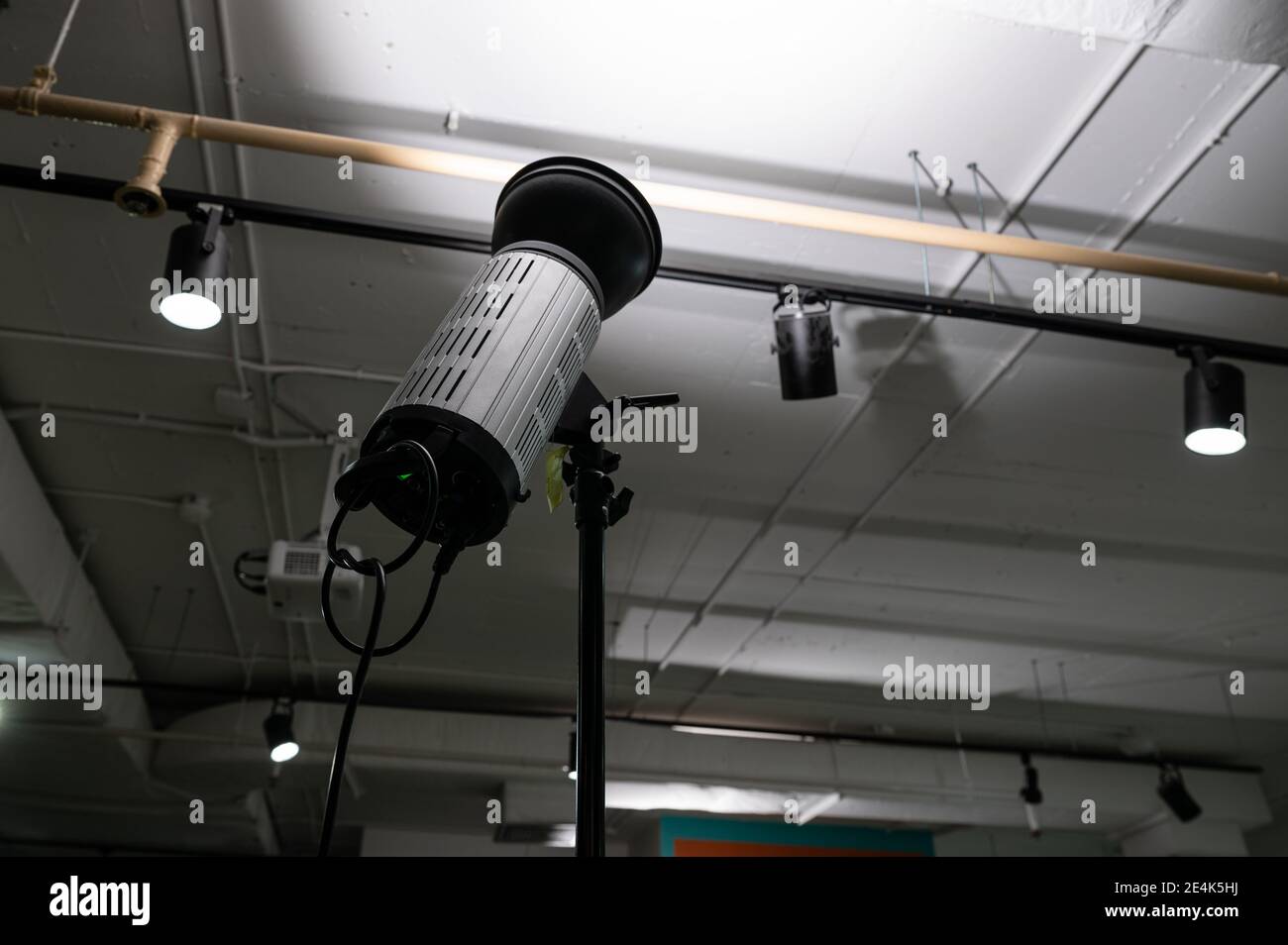 Studio light shining bounce lighting on ceiling in room Stock Photo - Alamy