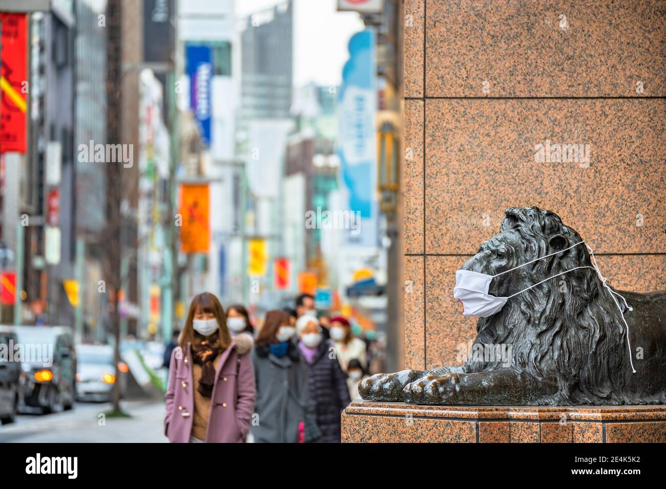 tokyo, japan - january 08 2021: Pedestrian wearing a mask walking ...