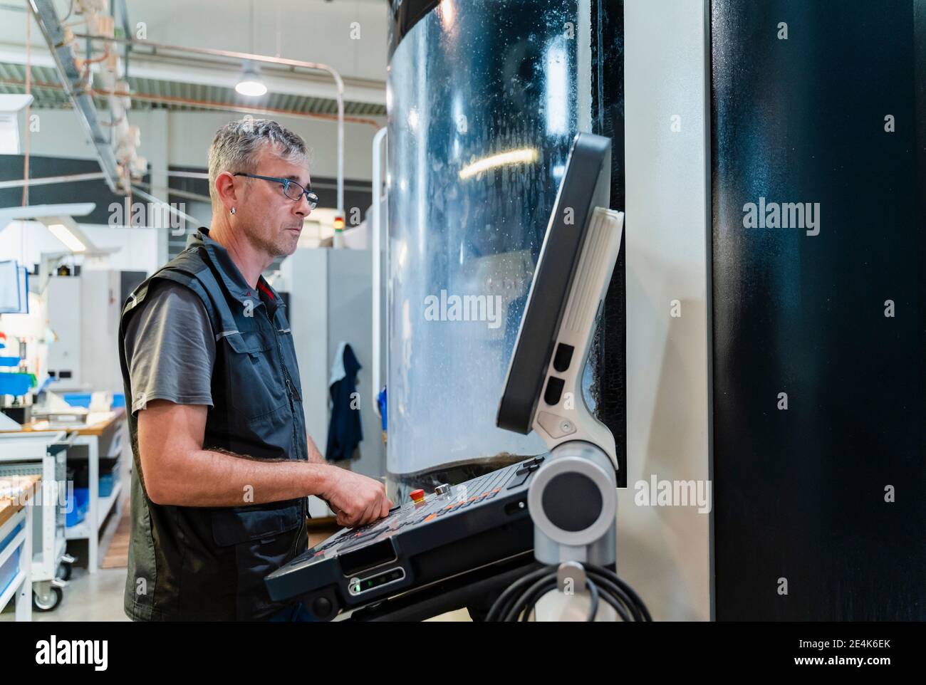 Standing expertise operating technology hi-res stock photography and ...