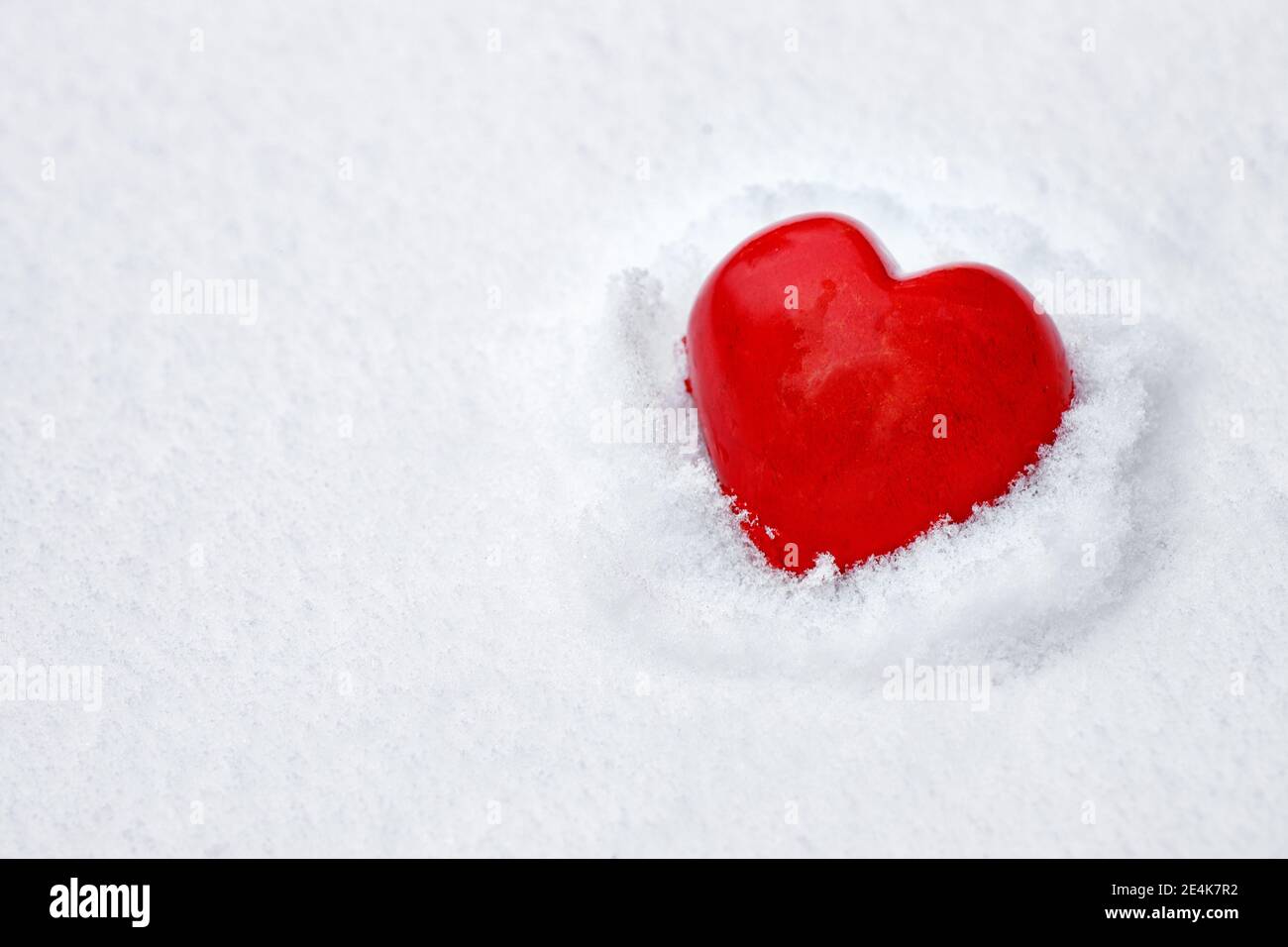 Heart on snow hi-res stock photography and images - Alamy