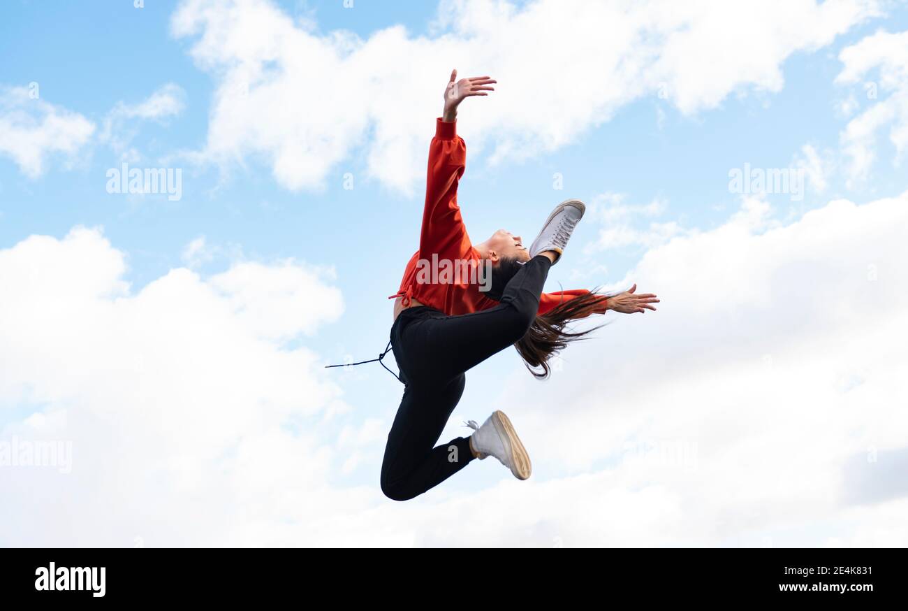 Jumping with long hair hi-res stock photography and images - Alamy