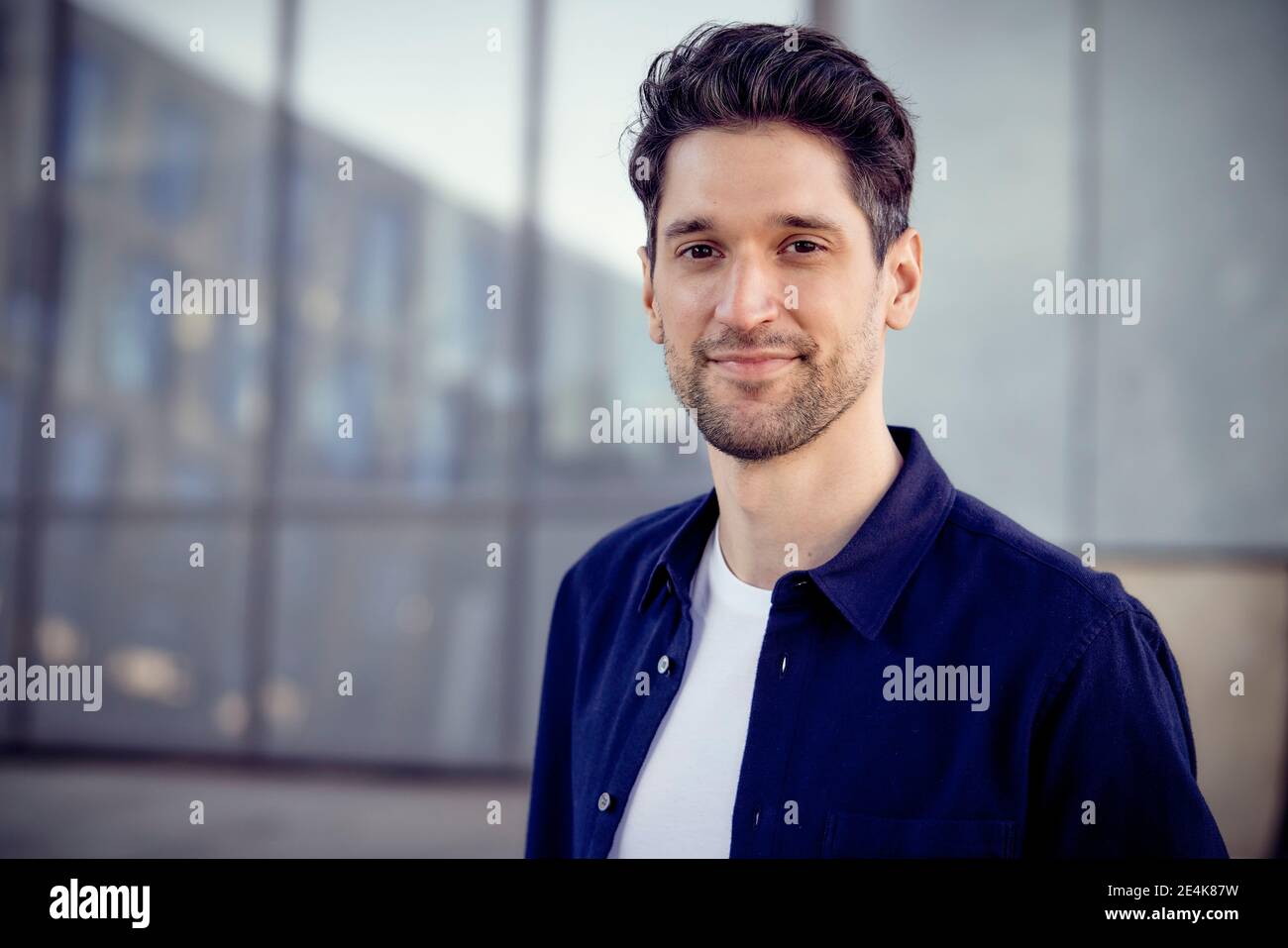 Confident entrepreneur standing outdoors Stock Photo - Alamy