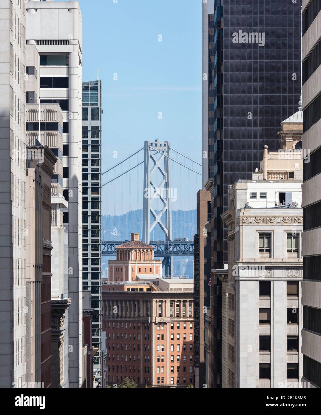 Building with Oakland Bay Bridge in background at San Francisco ...