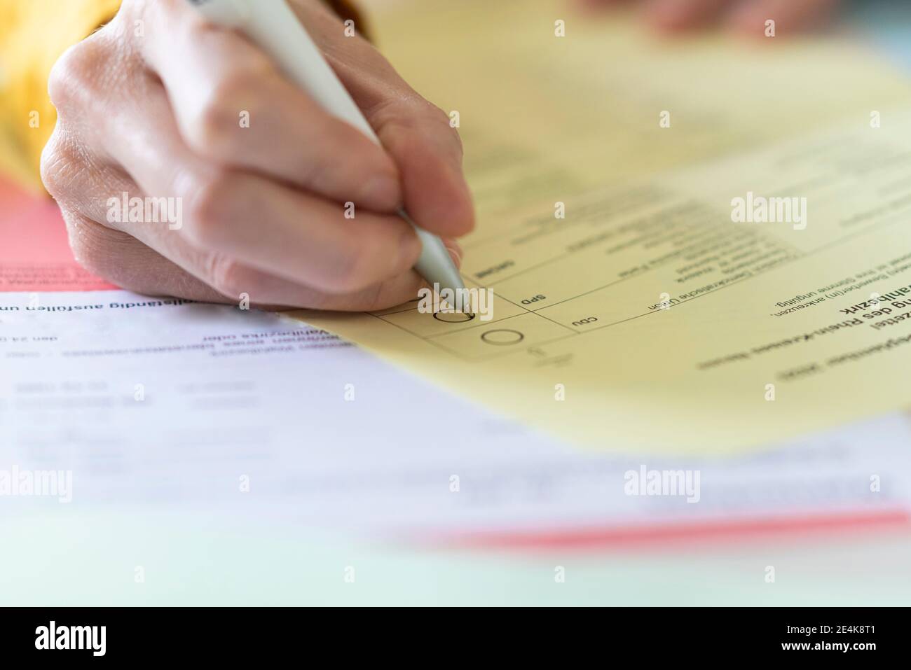 Holding voting form in hand hi-res stock photography and images - Alamy