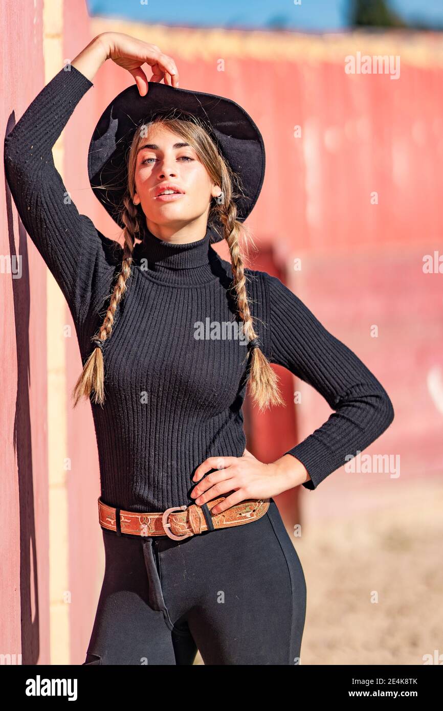 Portrait of female rancher in black hat Stock Photo - Alamy