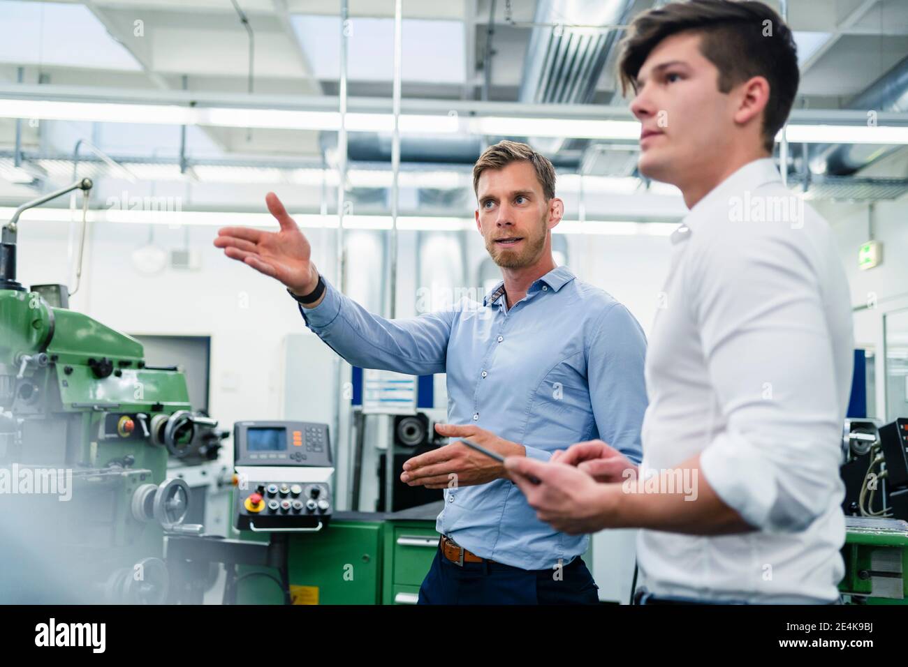 Explaining male hi-res stock photography and images - Alamy