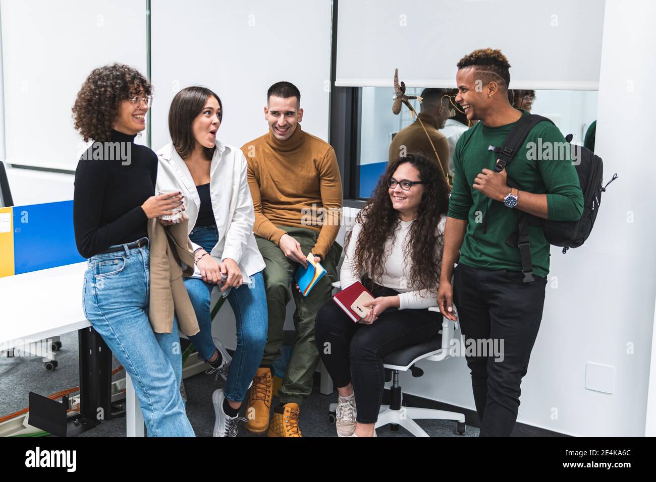 Male and female talking at work hi-res stock photography and images - Alamy