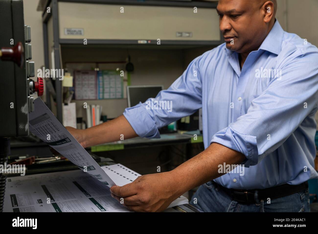 Supervisor checking up on employee hi-res stock photography and images ...